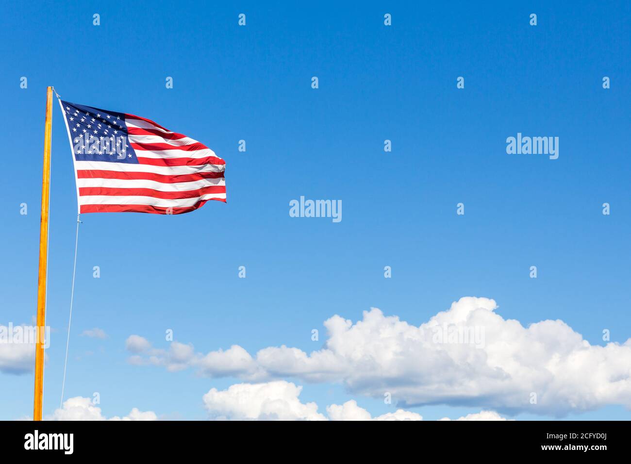 Stars and stripes American flag fluttering in the wind, Bar Harbor ...