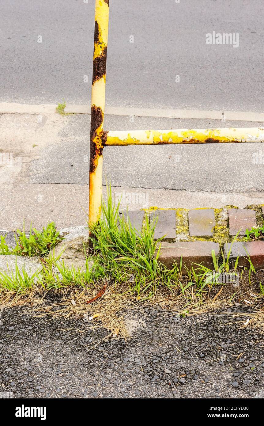 Old rusty metal yellow barrier Stock Photo - Alamy
