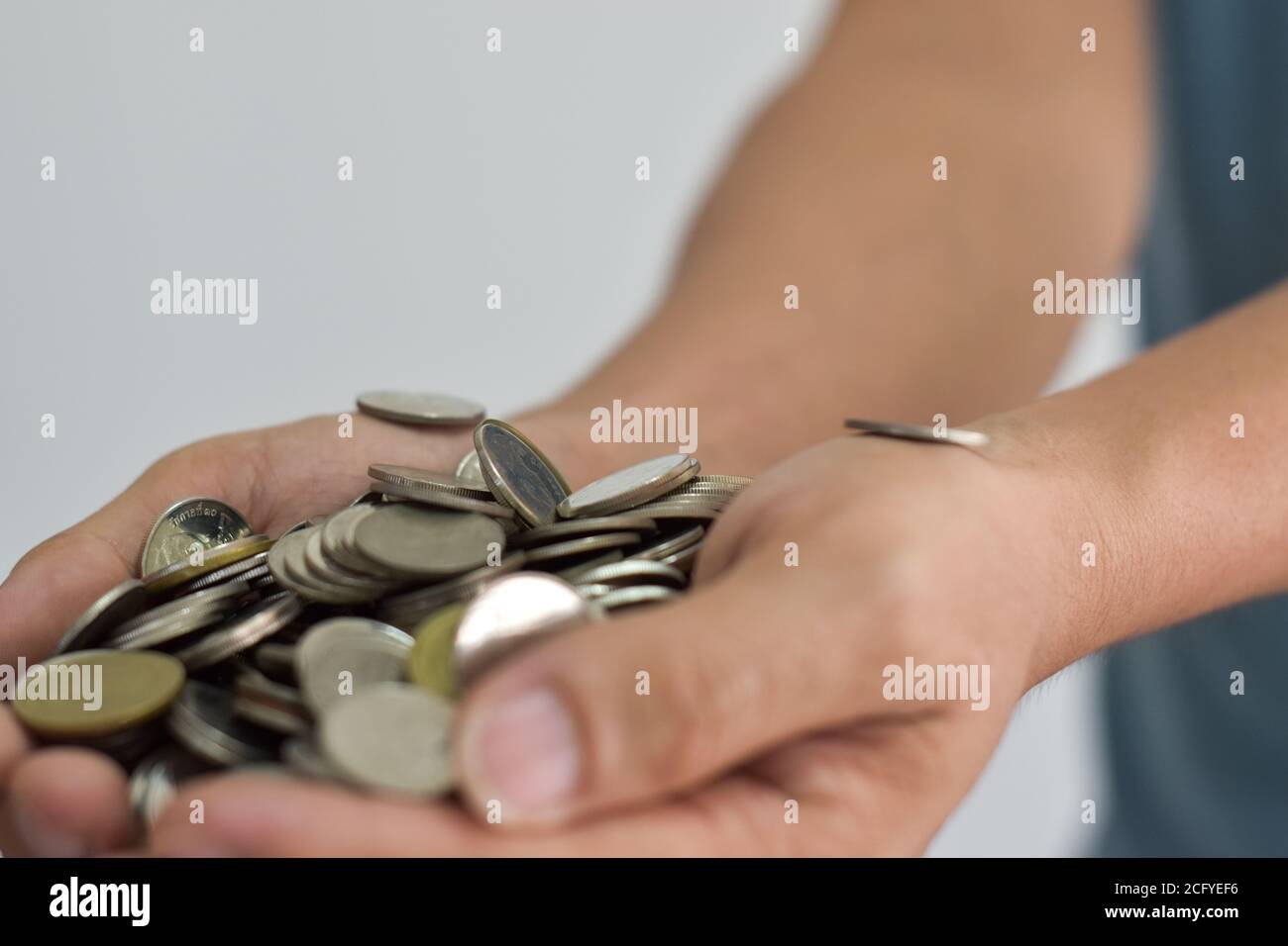 Man saving money new hi-res stock photography and images - Alamy