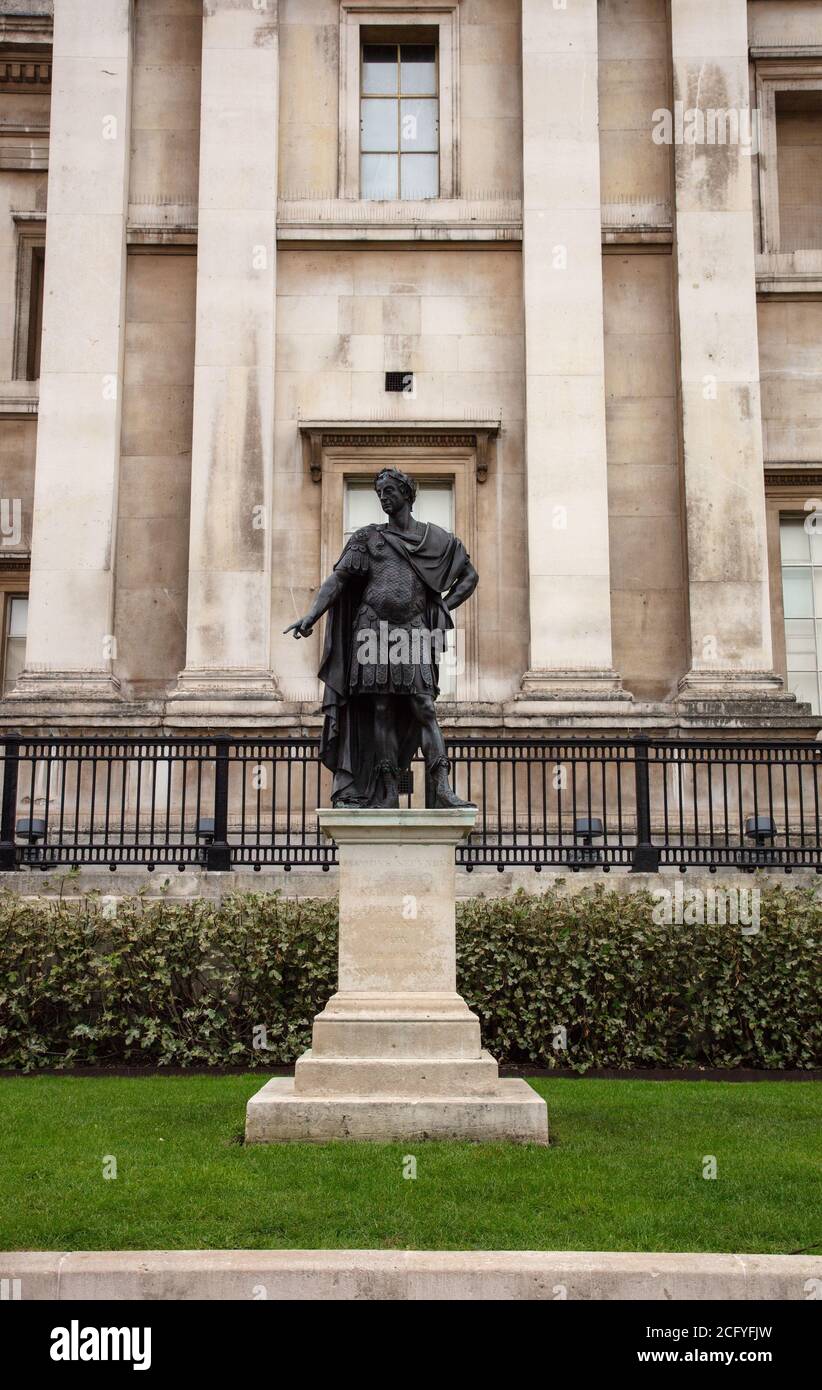 A bronze statue of James II is seen in front of the national Gallery on ...