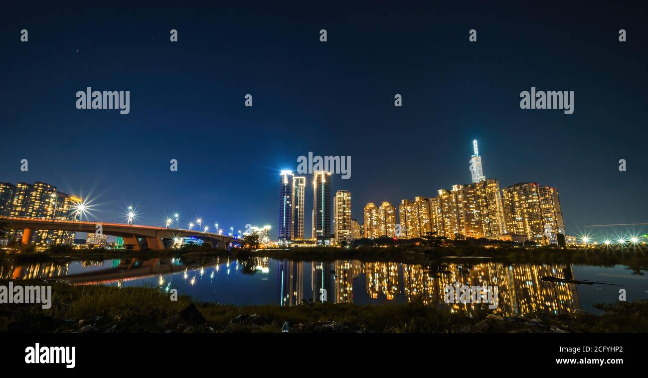 Panorama night view at Landmark 81 is a super tall skyscraper in center ...