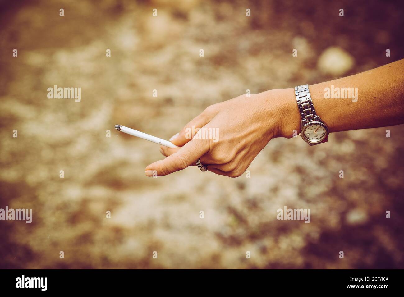 Womans hand with a smoke hi-res stock photography and images - Alamy
