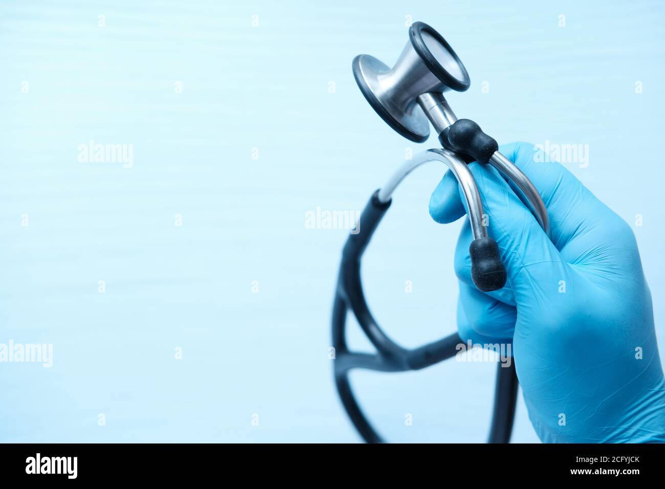 Young doctor using stethoscope check hi-res stock photography and ...