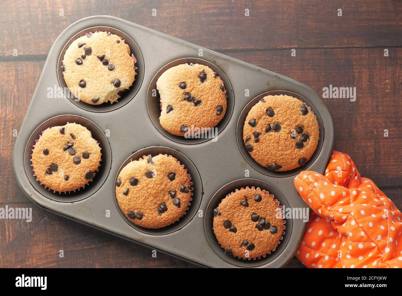 Top view of women hand holding chocolate pan cake Stock Photo - Alamy