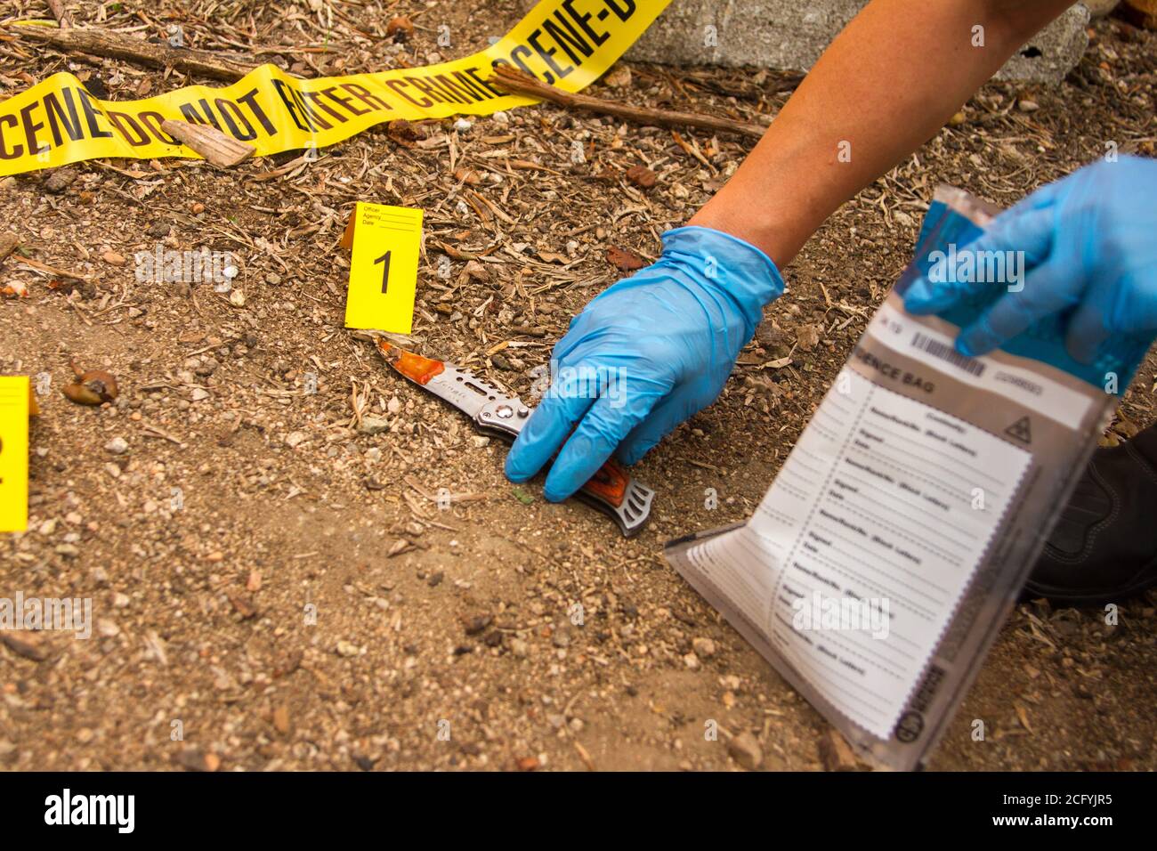 Knife blood police tape hi-res stock photography and images - Alamy