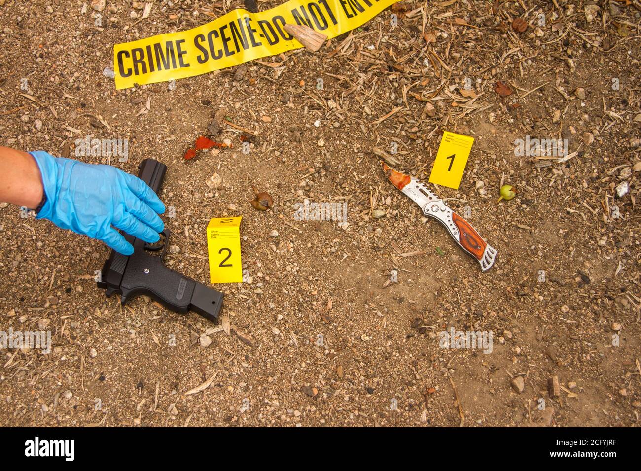 Crime Scene Tape Hand High Resolution Stock Photography and Images - Alamy