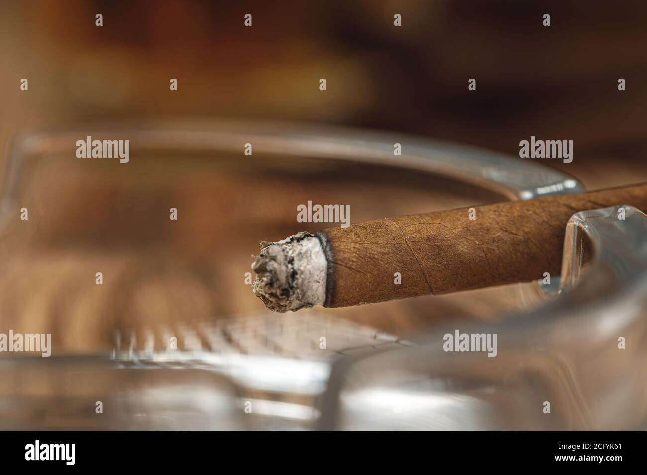 Lighted cigar hi-res stock photography and images - Alamy