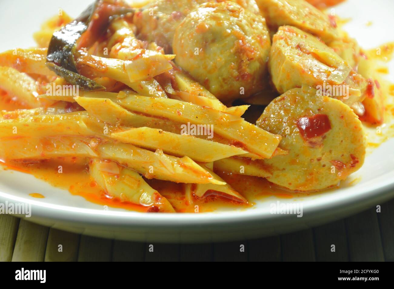 spicy stir fried bamboo shoot with pork ball curry on plate Stock Photo ...