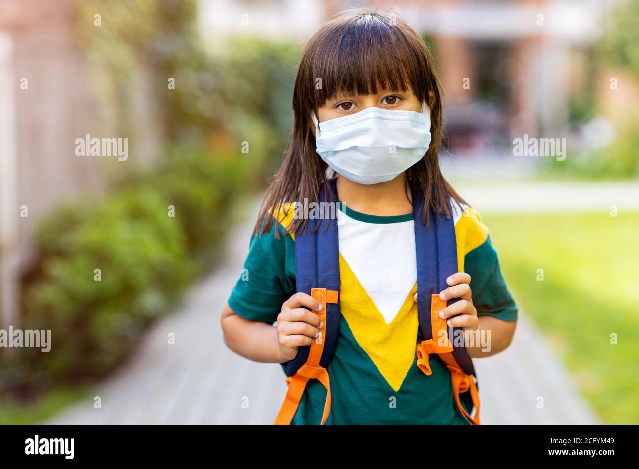 Little girl wearing protective mask Stock Photo - Alamy
