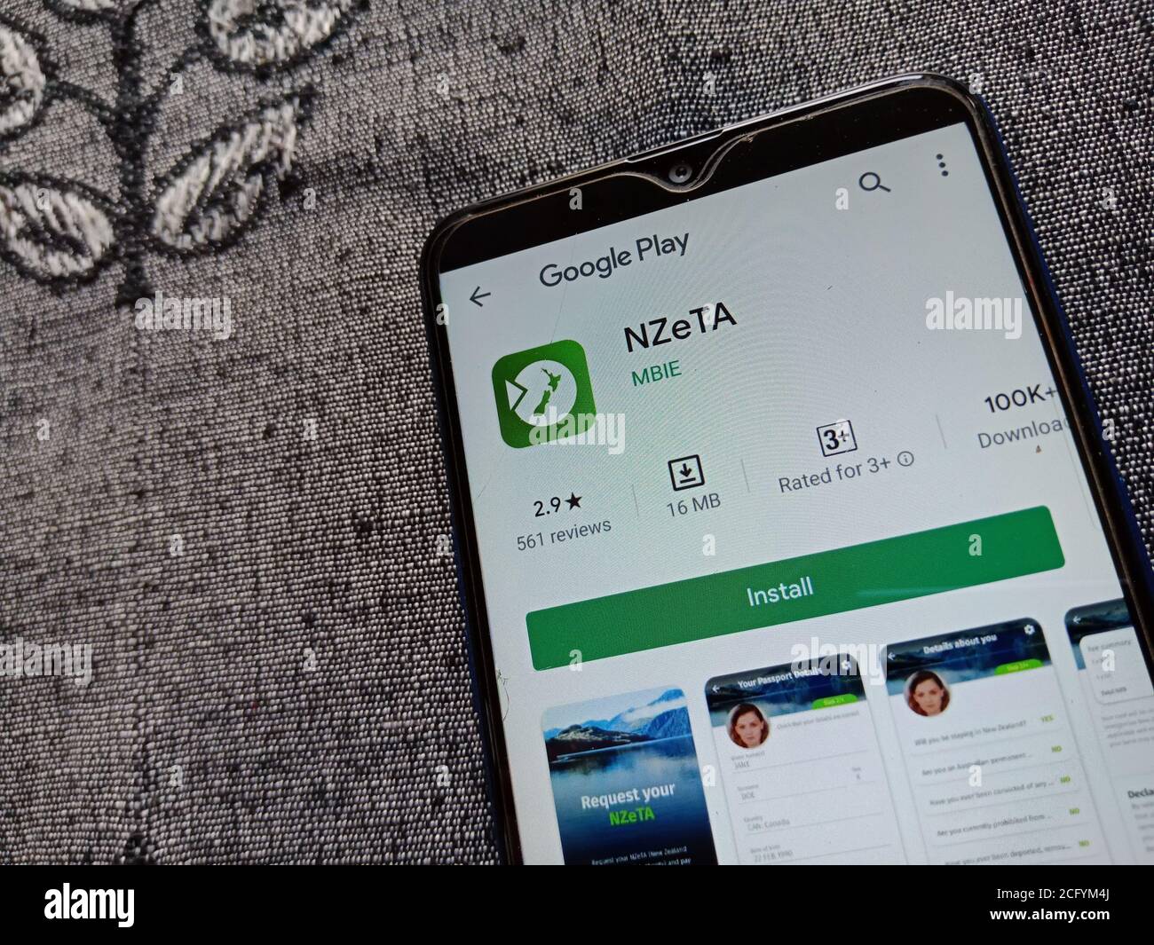 DISTRICT KATNI, INDIA - MAY 04, 2020: NZETA android apps displayed on isolated smart phone at ...