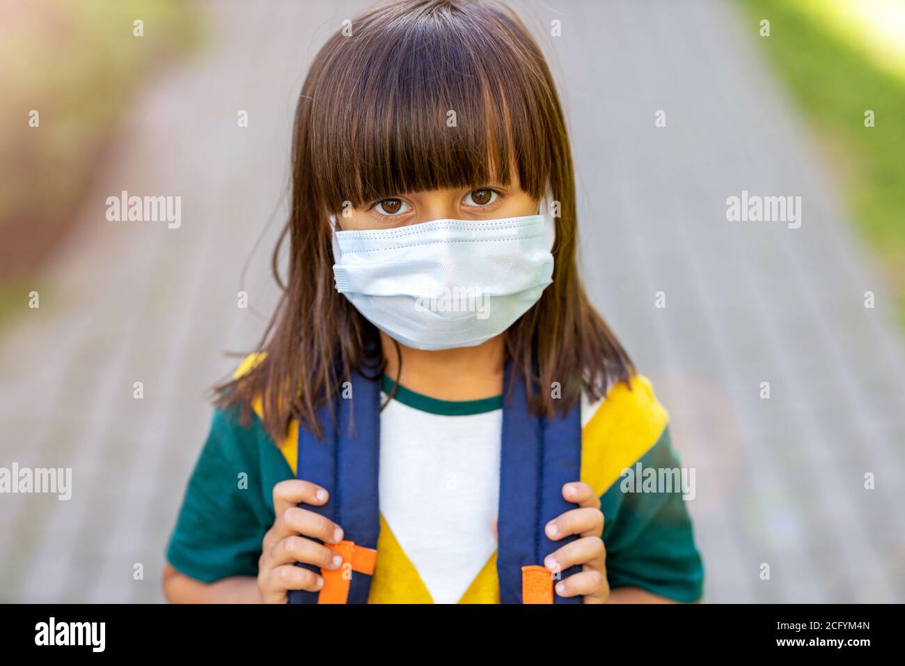 Little girl wearing protective mask Stock Photo - Alamy