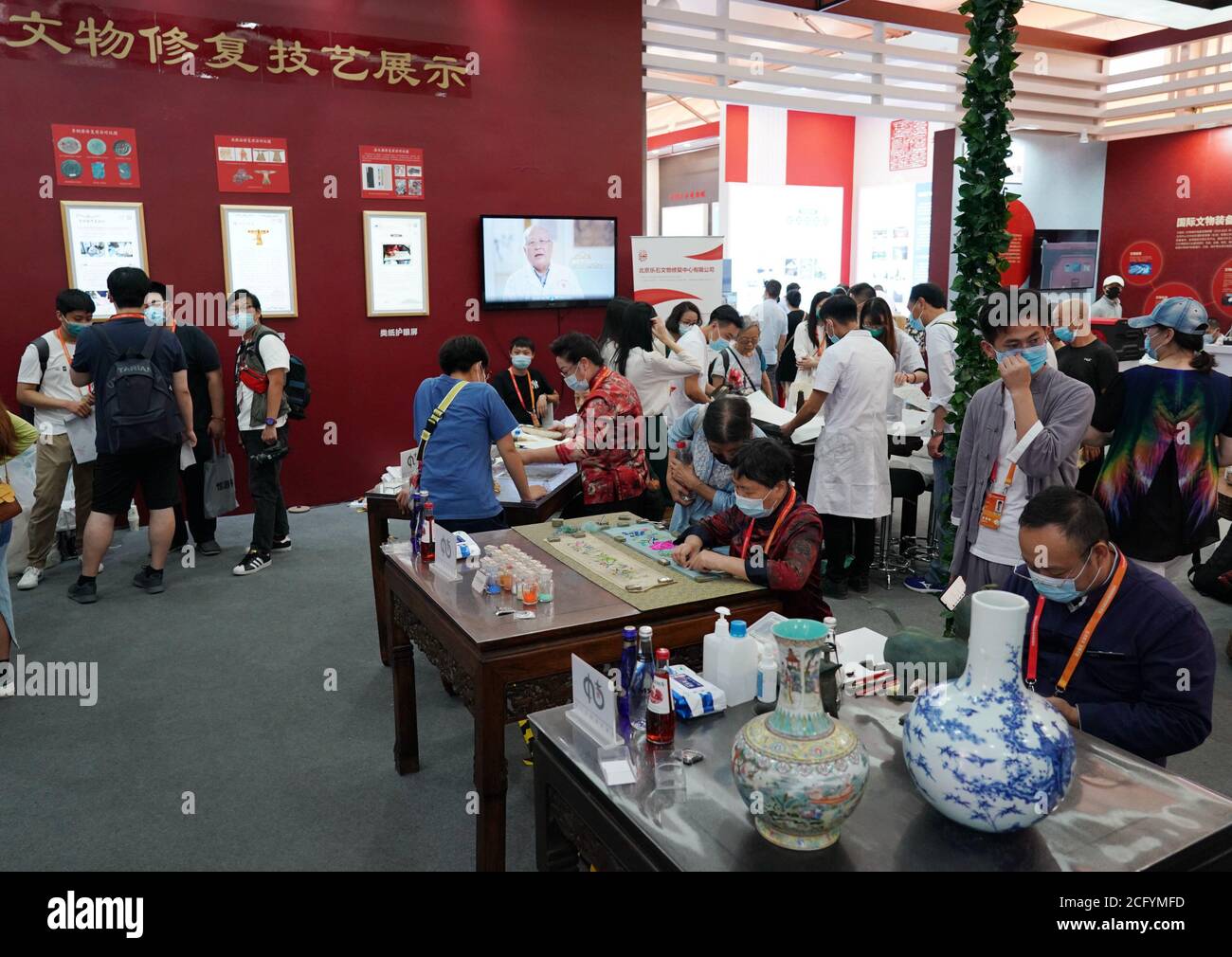 Beijing, China. 8th Sep, 2020. Cultural relics restoration experts ...