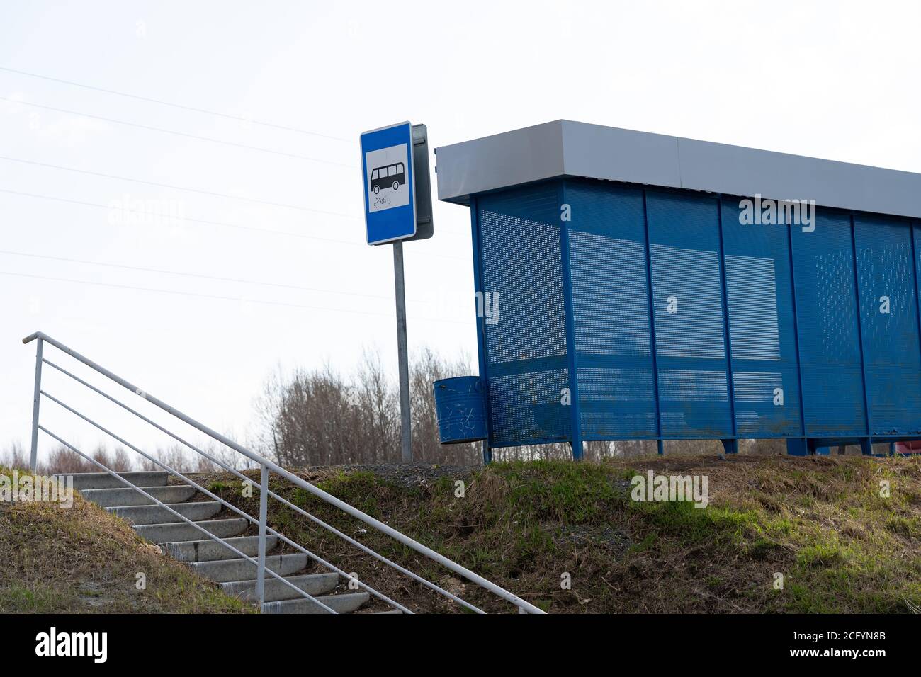 Stop the suburban bus. Modern steel roadside bus stop with seat ...