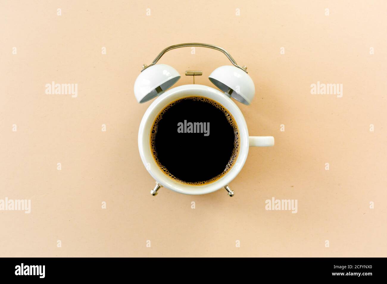 Coffee time, clock on yellow background. Flat lay, top view Stock Photo ...