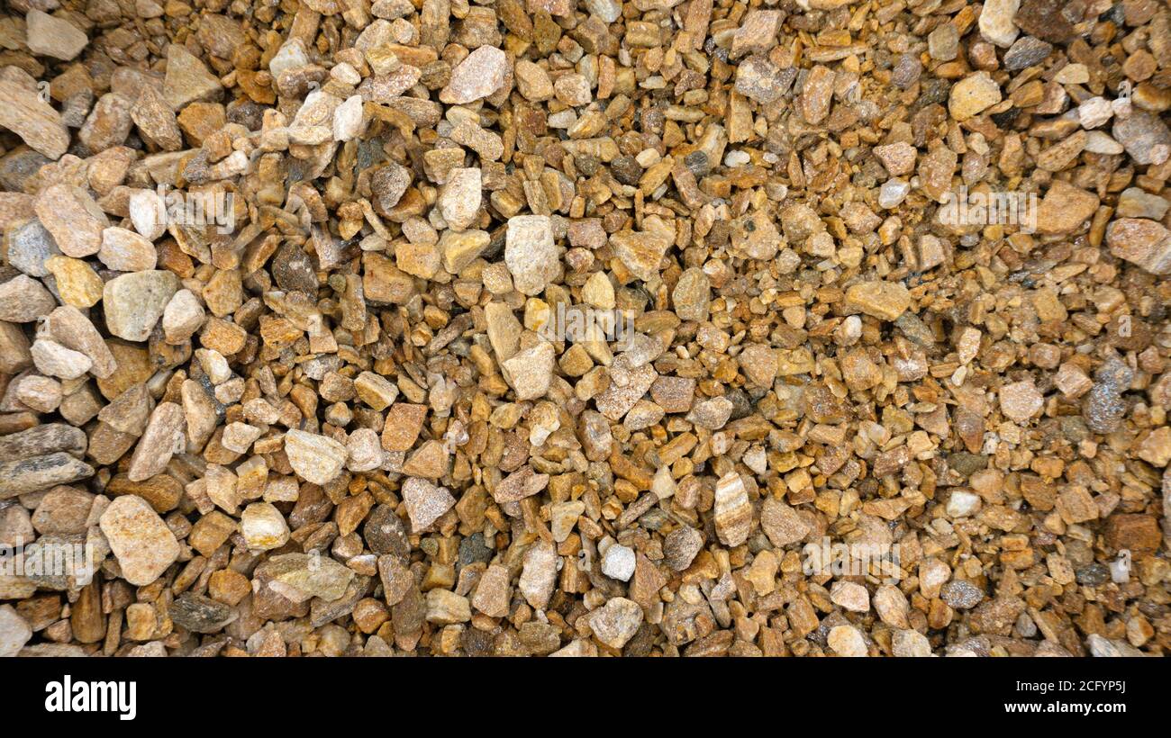 Natural crumb of goldstone or zlatolite for a stone background. Texture ...