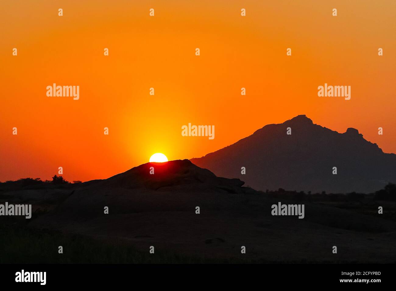 An image with dynamic range of Sun rise from behind the Aravalli ...