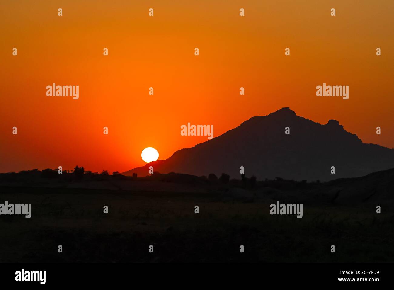 An image with dynamic range of Sun rise from behind the Aravalli ...
