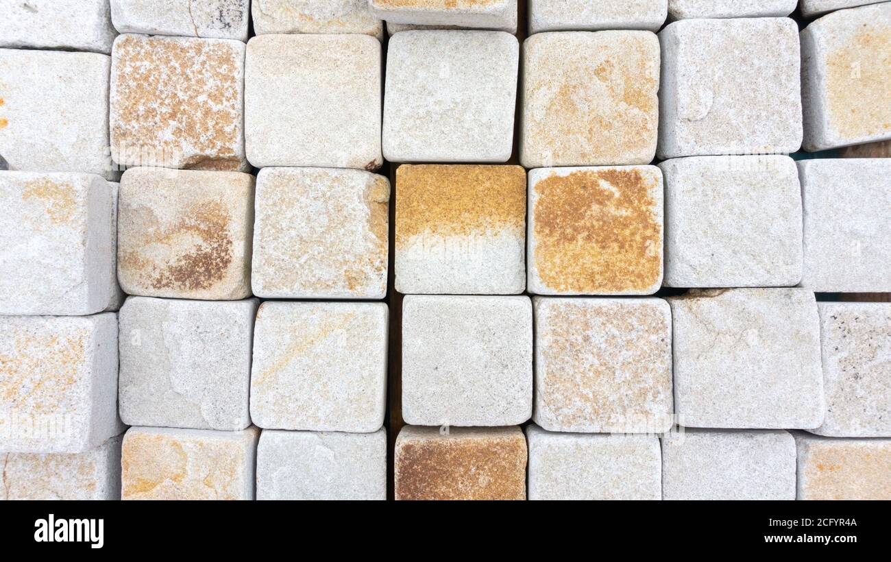 Stone tiles for paving paths. Stone paving background. Background with ...