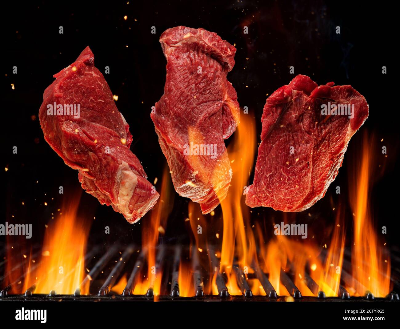 Flying raw beef steaks hi-res stock photography and images - Alamy