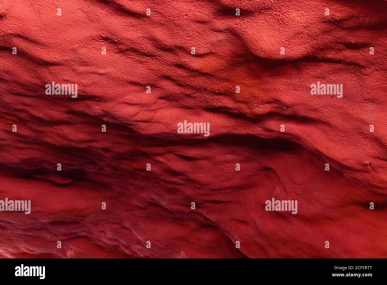 Red wave natural rock formation. Red rocks texture Stock Photo - Alamy
