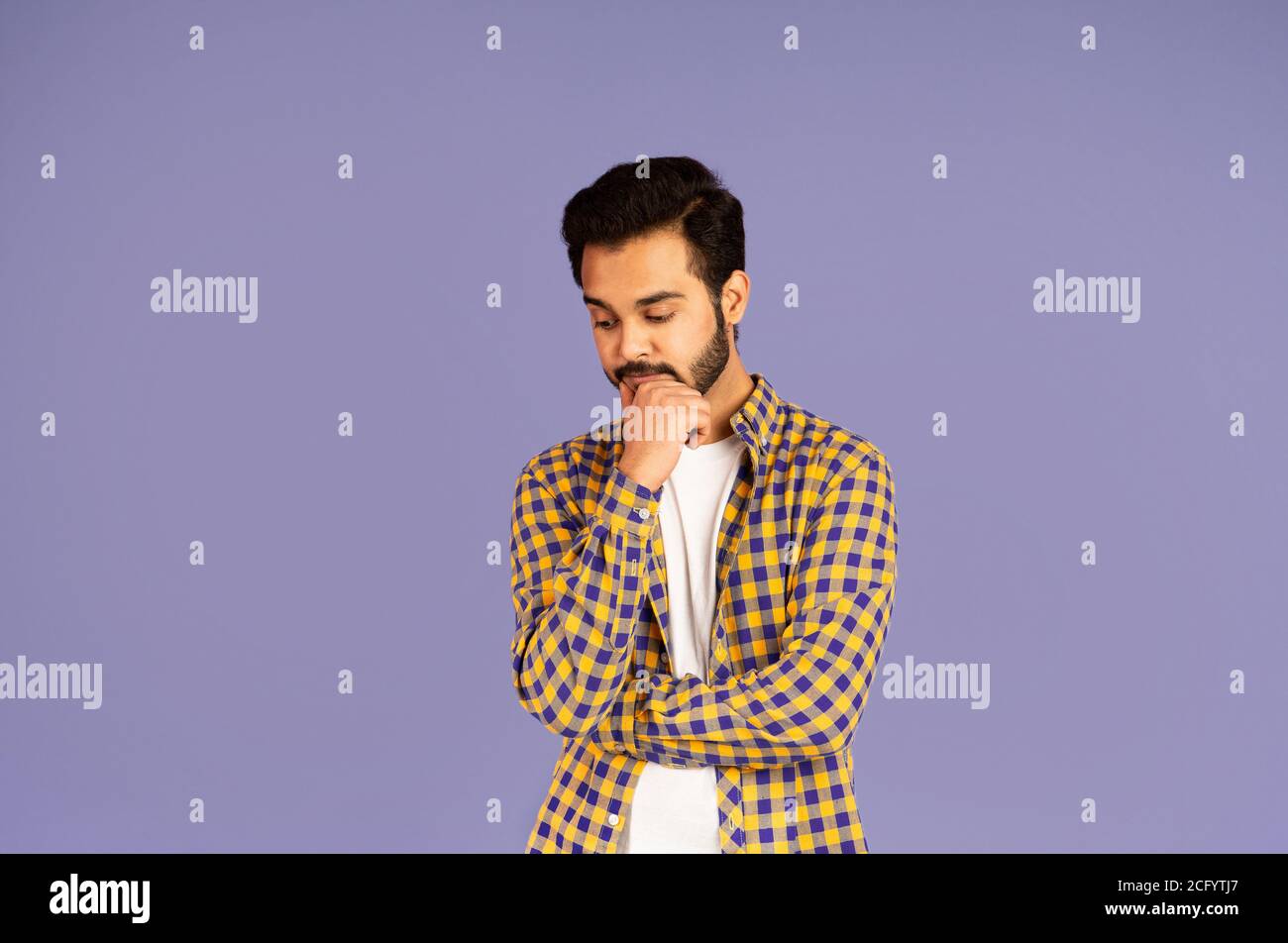 Guy pondering hi-res stock photography and images - Alamy