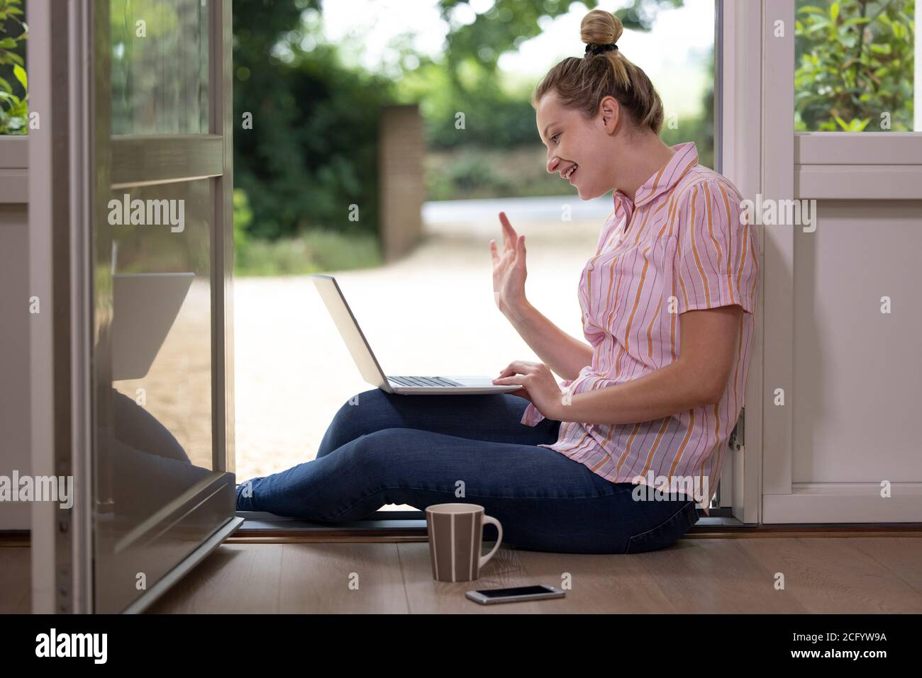 Woman on video call home hi-res stock photography and images - Alamy