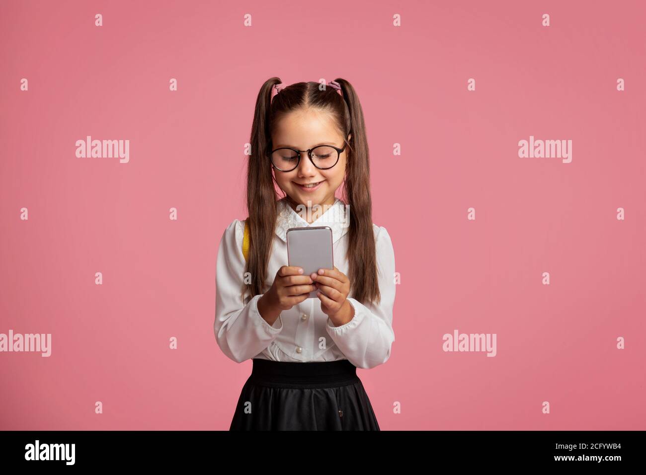 Elementary school girl typing hi-res stock photography and images - Alamy
