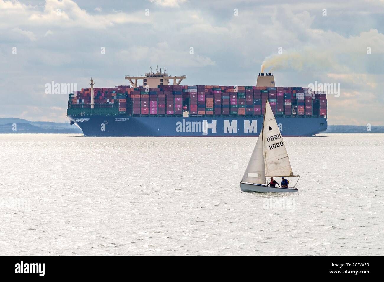 Container ship heading out hi-res stock photography and images - Alamy