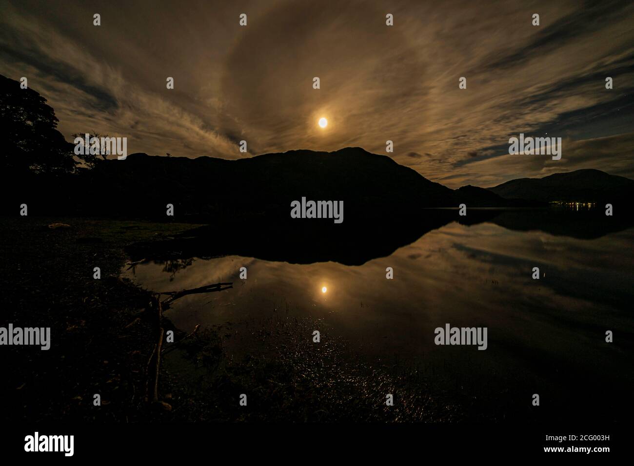 Cloudy moonlit night sky hi-res stock photography and images - Alamy