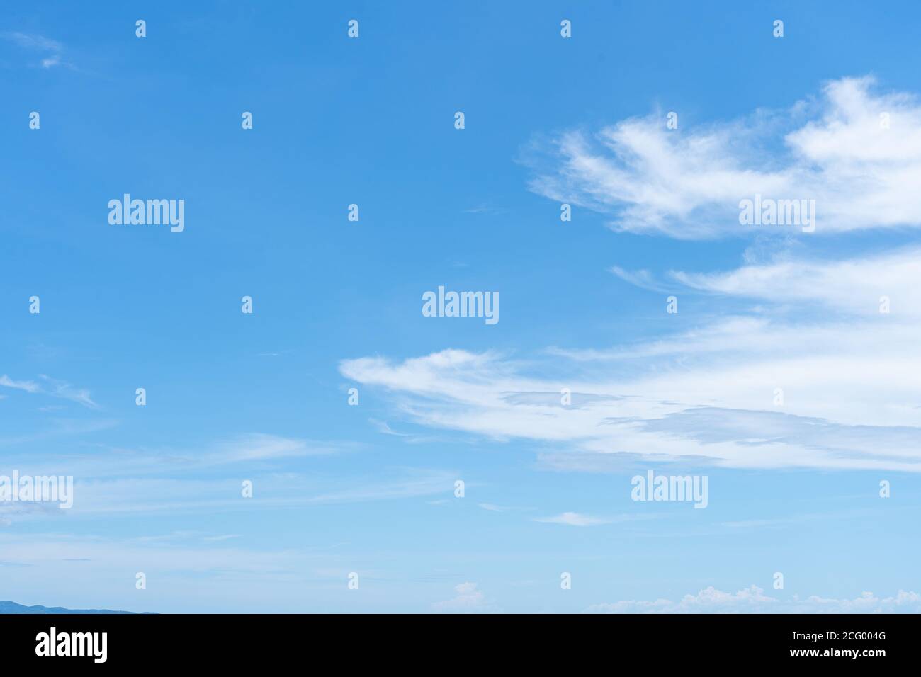 Clear blue sky with white cloud background in the morning. Good weather ...