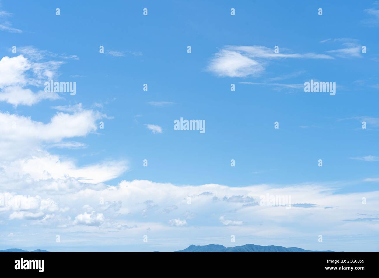 Clear blue sky with white cloud background in the morning. Good weather ...