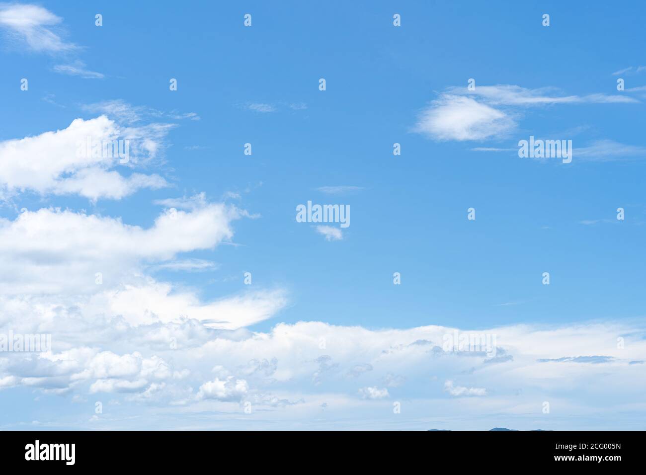 Clear blue sky with white cloud background in the morning. Good weather ...