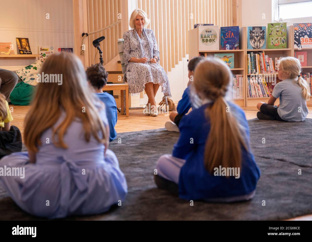 The Duchess of Cornwall speaks to pupils during a visit to Ivydale ...