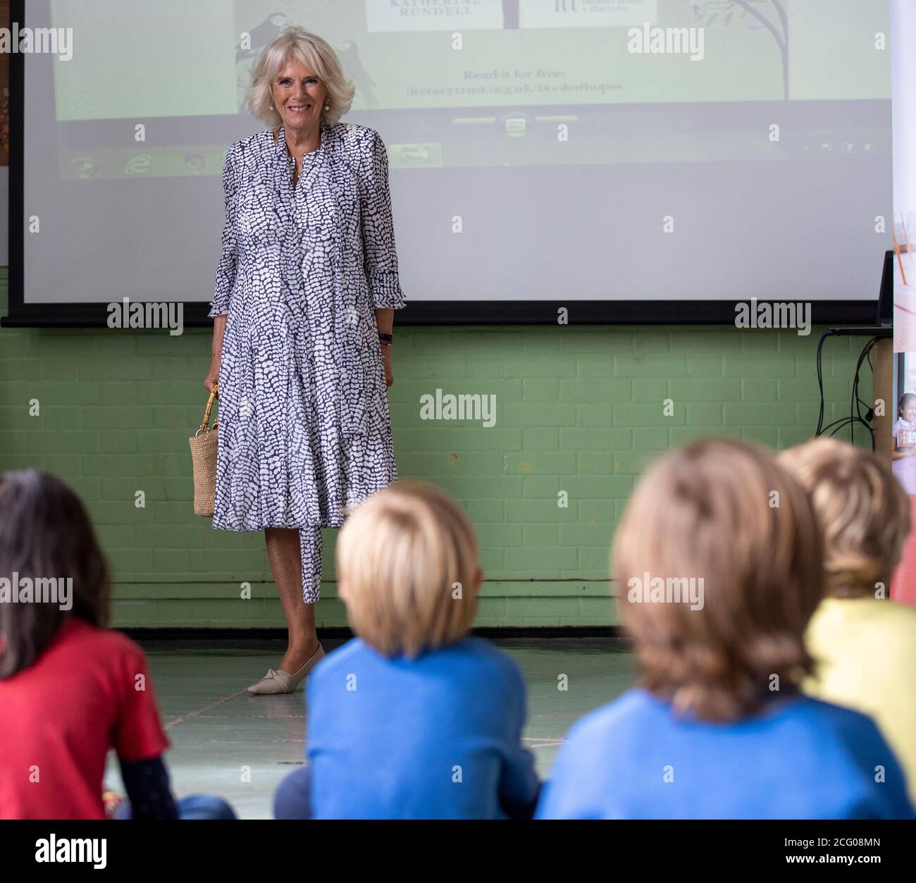 The Duchess of Cornwall speaks to pupils during a visit to Ivydale ...