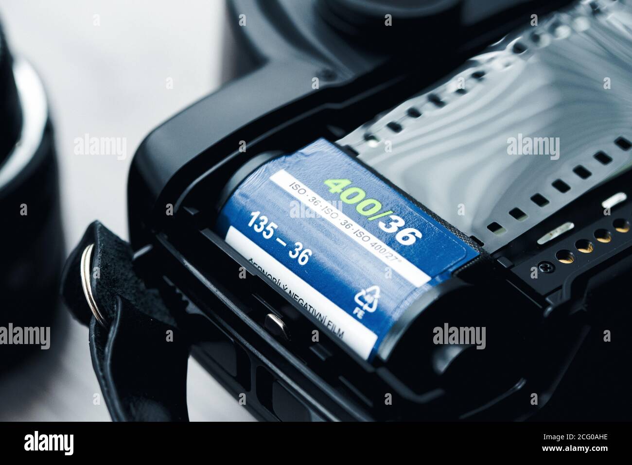 Old open film camera with new negative film Stock Photo - Alamy