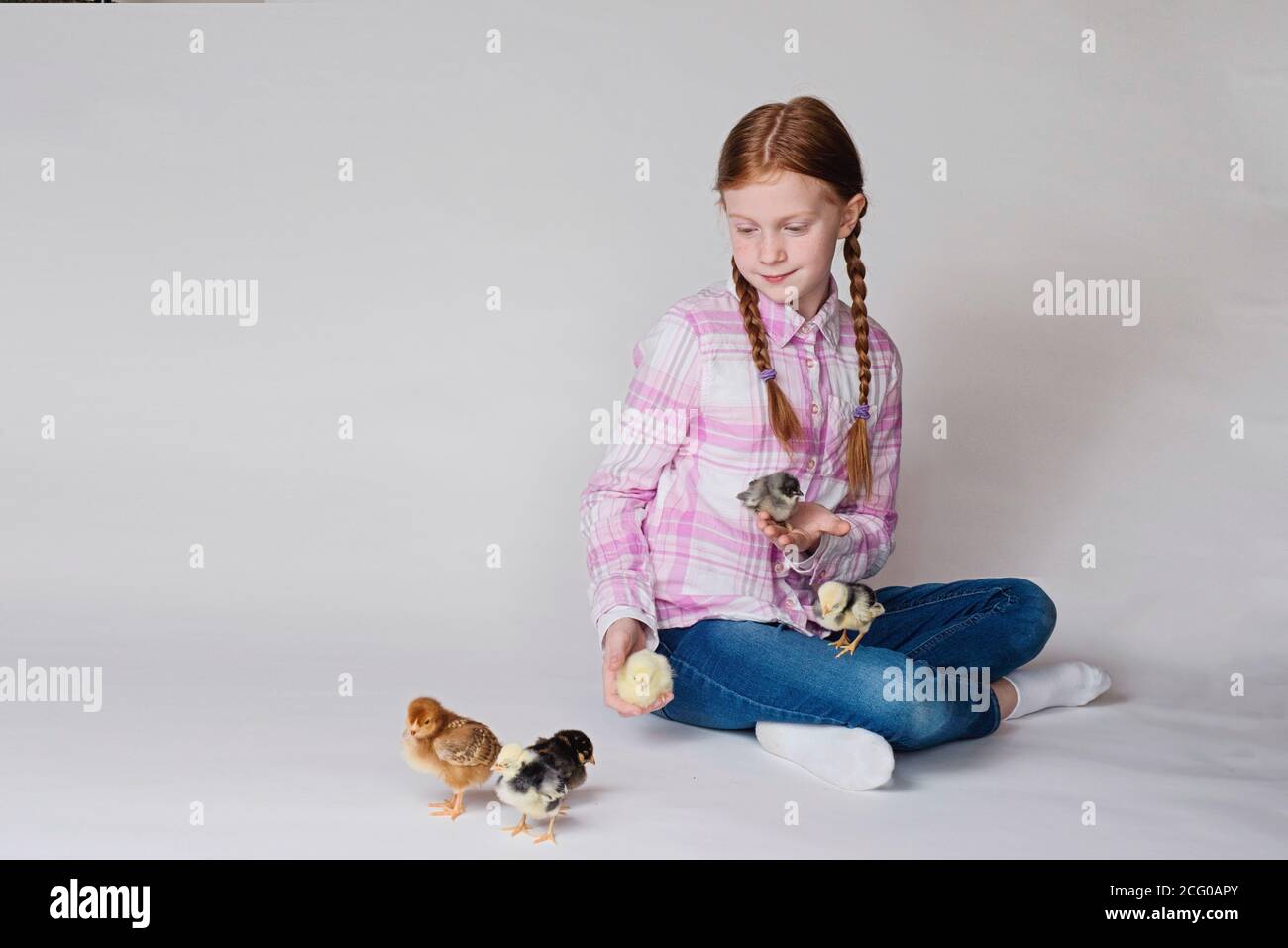 Preteen girl in plaid hi-res stock photography and images - Alamy