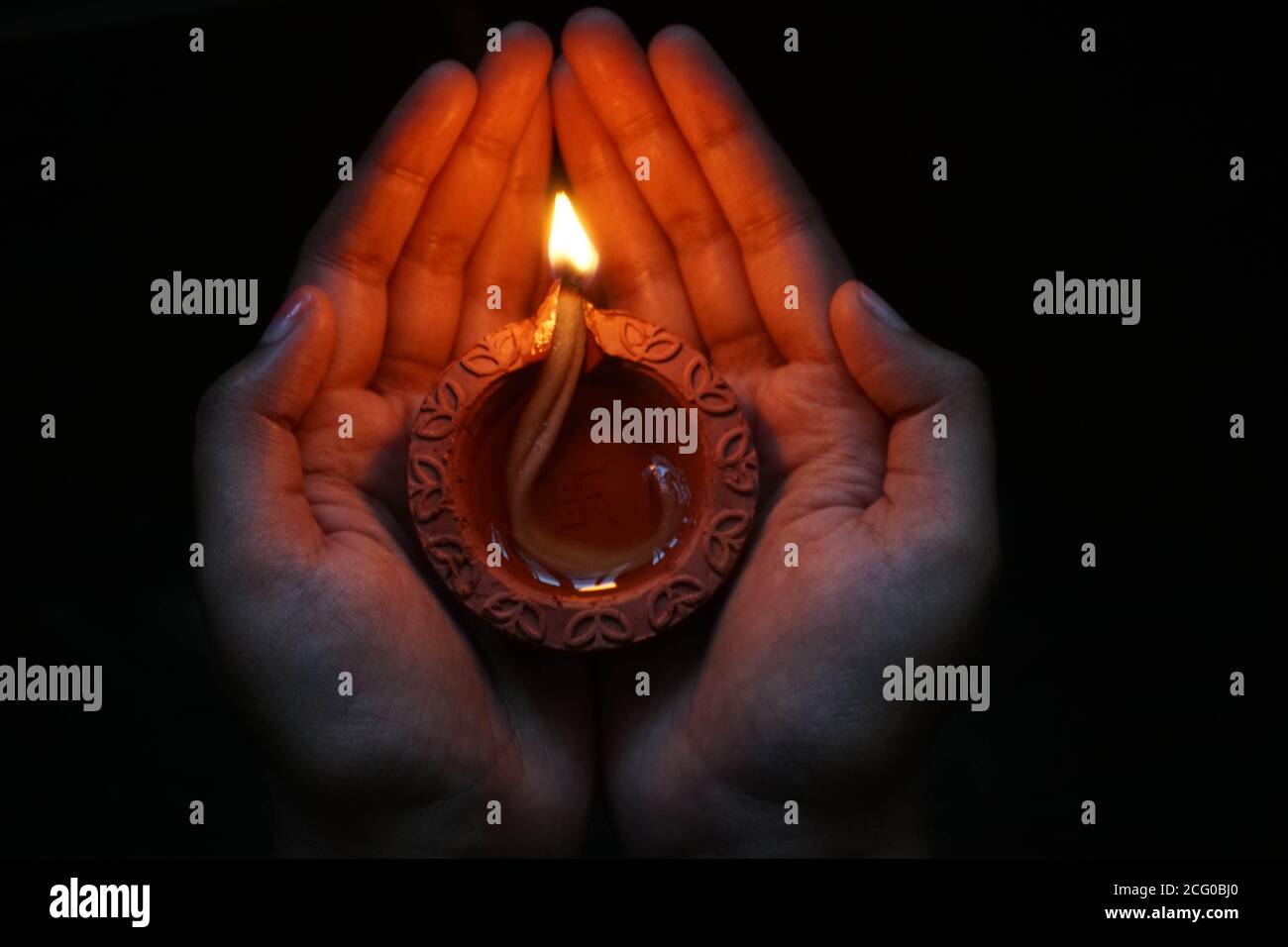 Holding oil lamp hi-res stock photography and images - Alamy