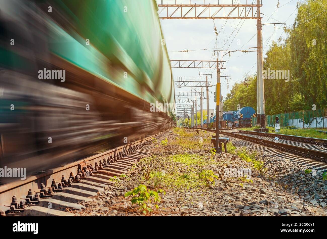 freight train travels on railway Stock Photo - Alamy