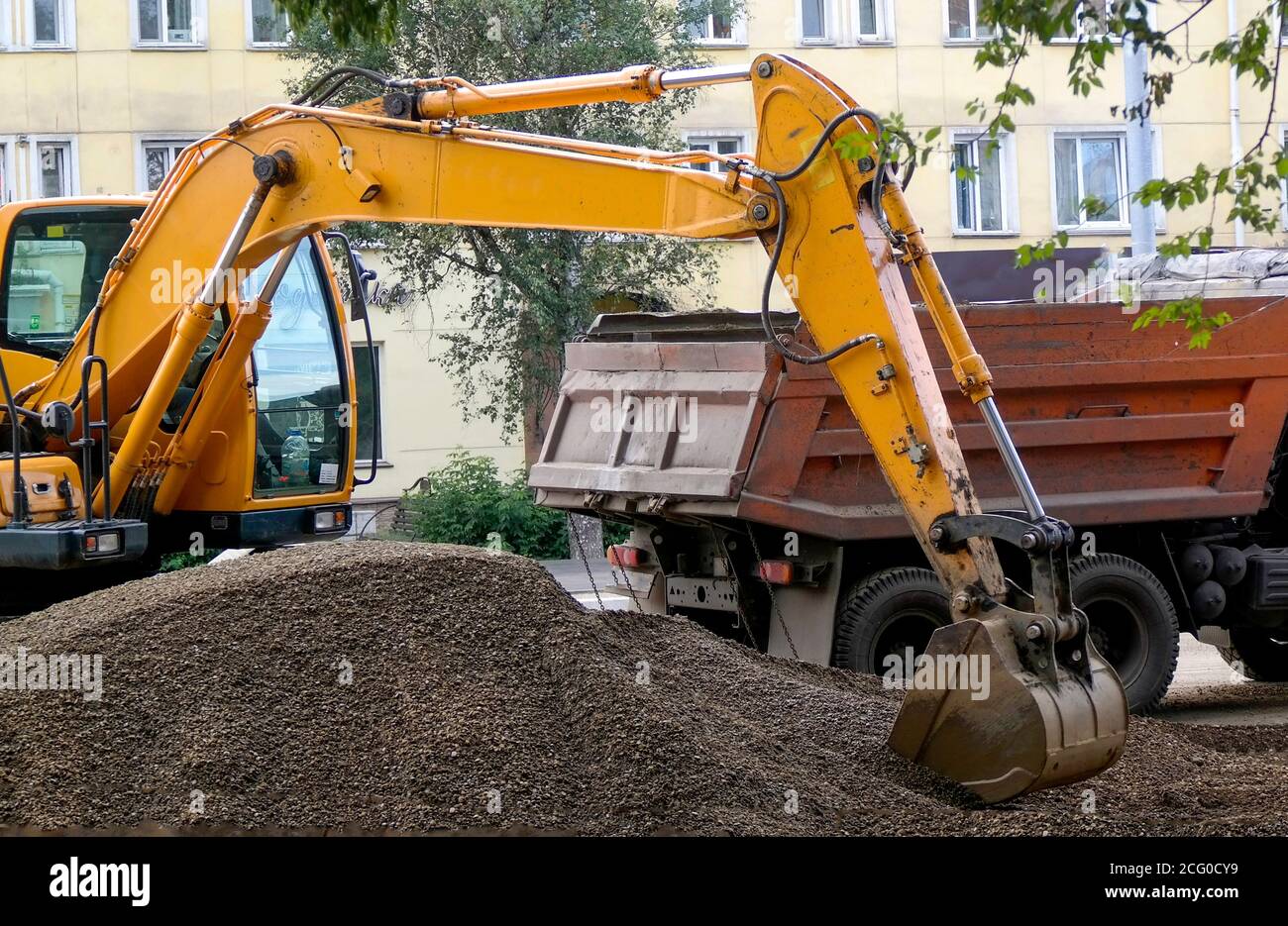 Digger bucket broken road hi-res stock photography and images - Alamy