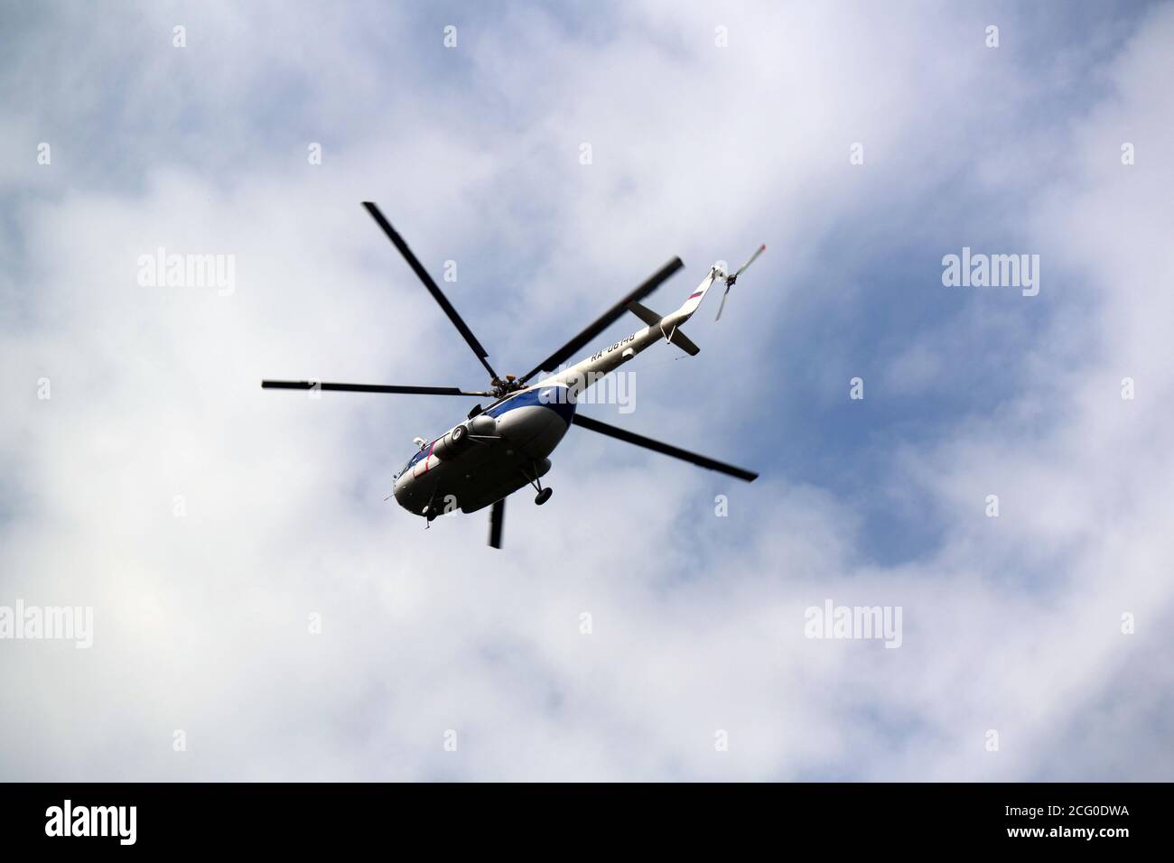the helicopter is flying overhead Stock Photo - Alamy