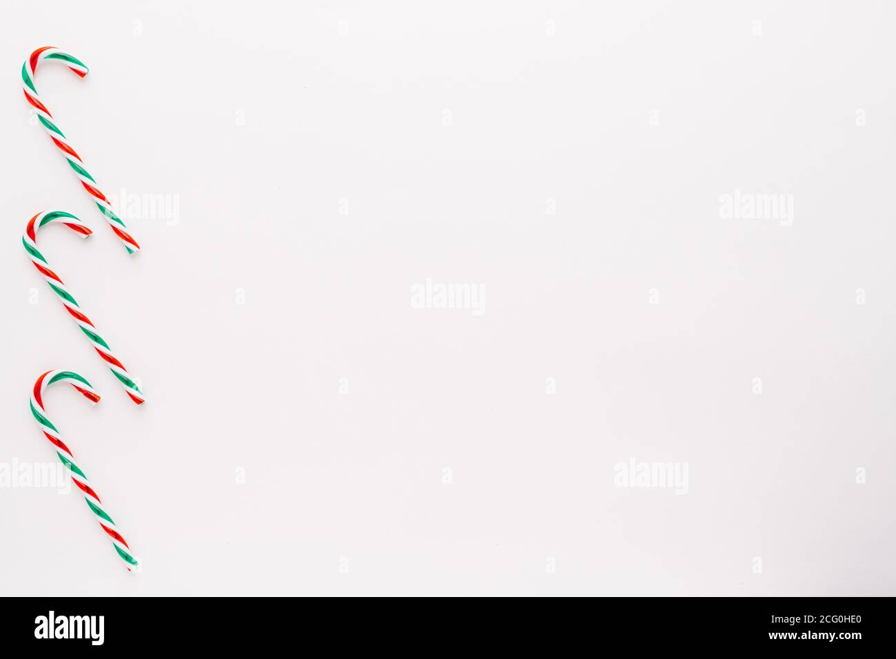 Traditional christmas sweets, candy cane sweets on white background ...