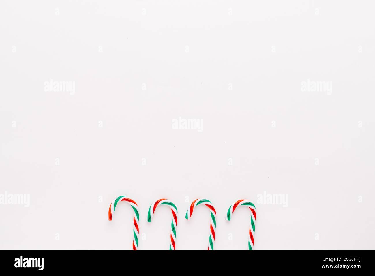 Traditional christmas sweets, candy cane sweets on white background ...