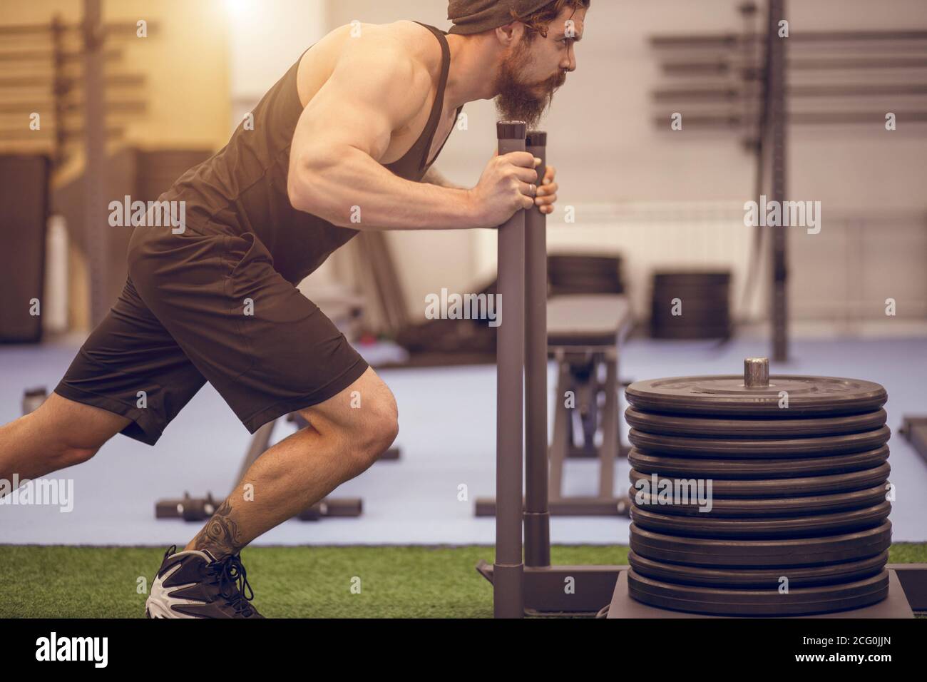 Athletic man pushing barbell in hi-res stock photography and images - Alamy