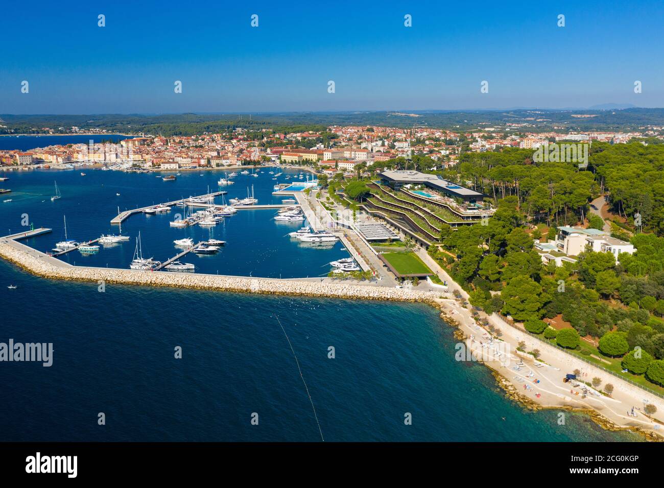 Aerial photo of hotels, beach and marina in Rovinj town, Istra, Croatia ...