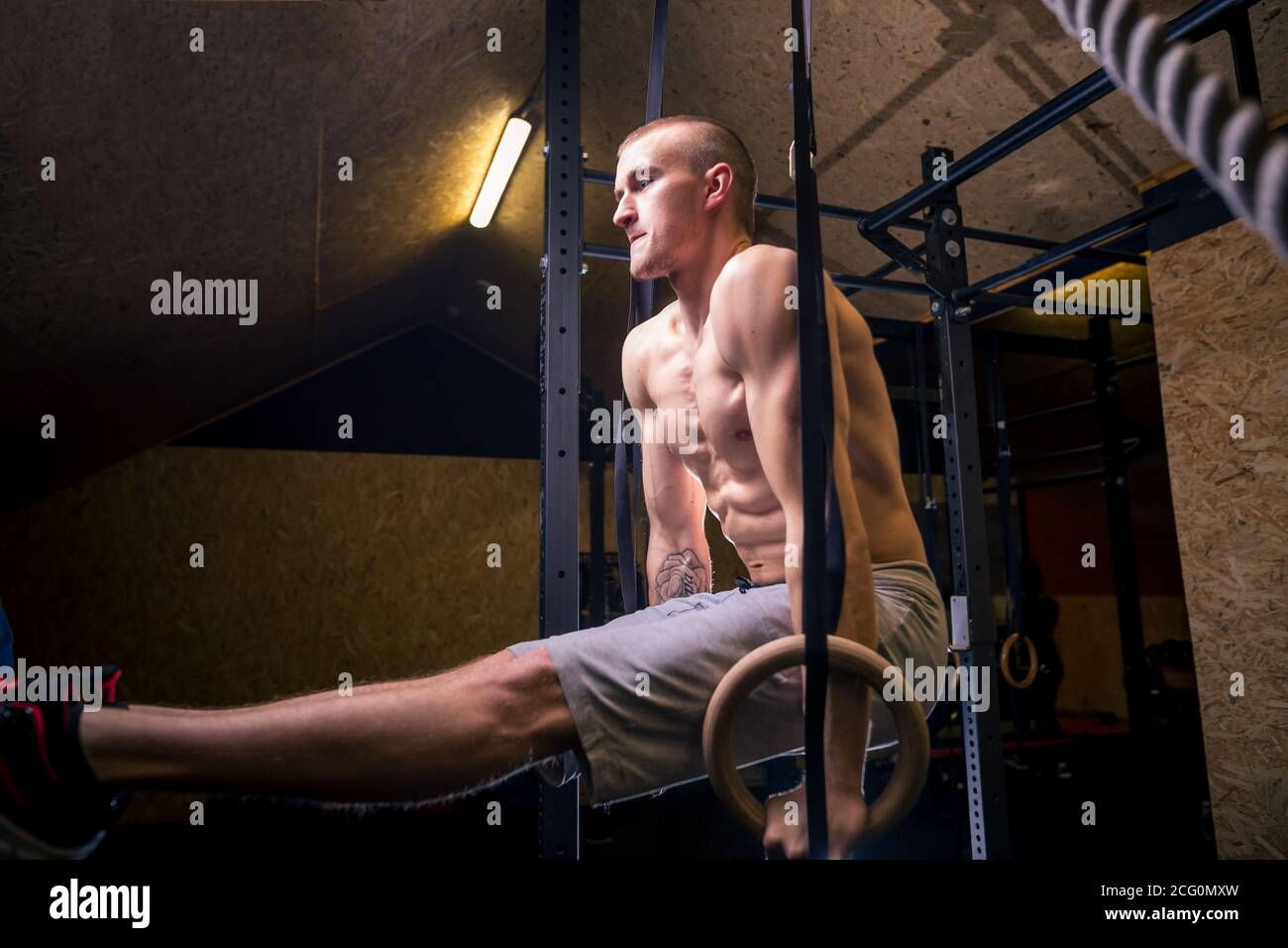 Fitness dip ring man workout at gym dipping exercise Stock Photo - Alamy