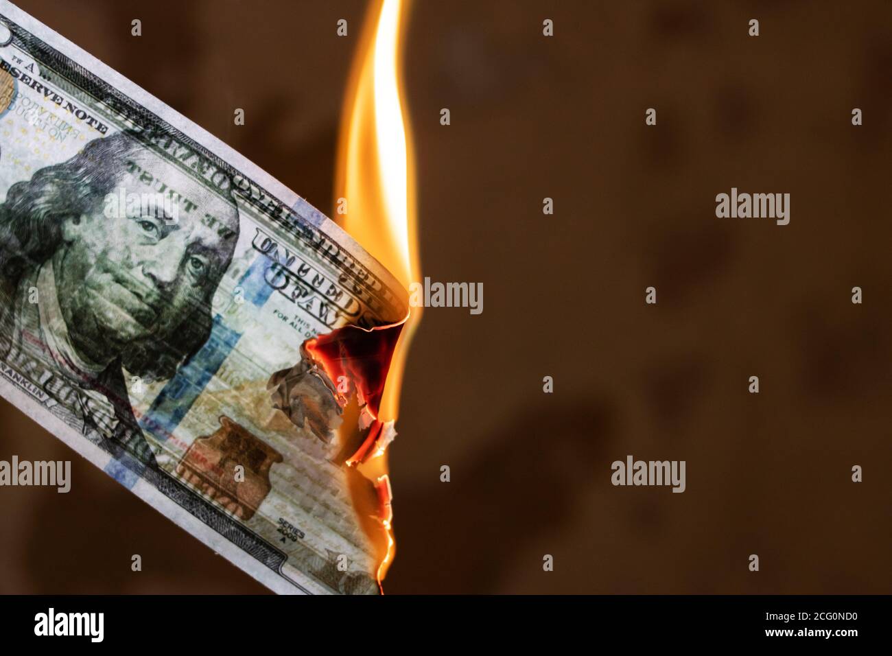 Burning dollar bill hi-res stock photography and images - Alamy