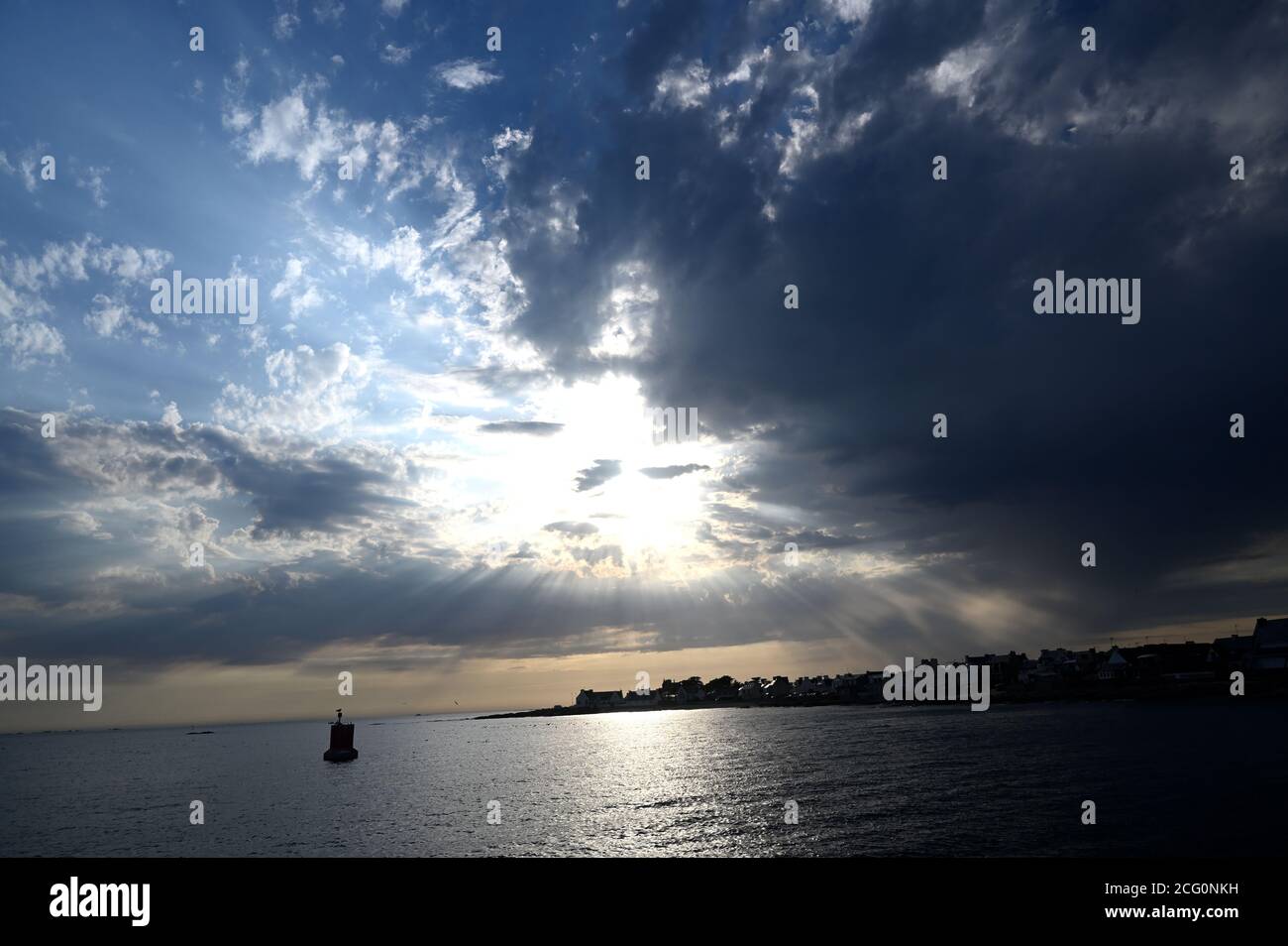 A village in the background. Clouds giving a dramatic atmosphere Stock ...
