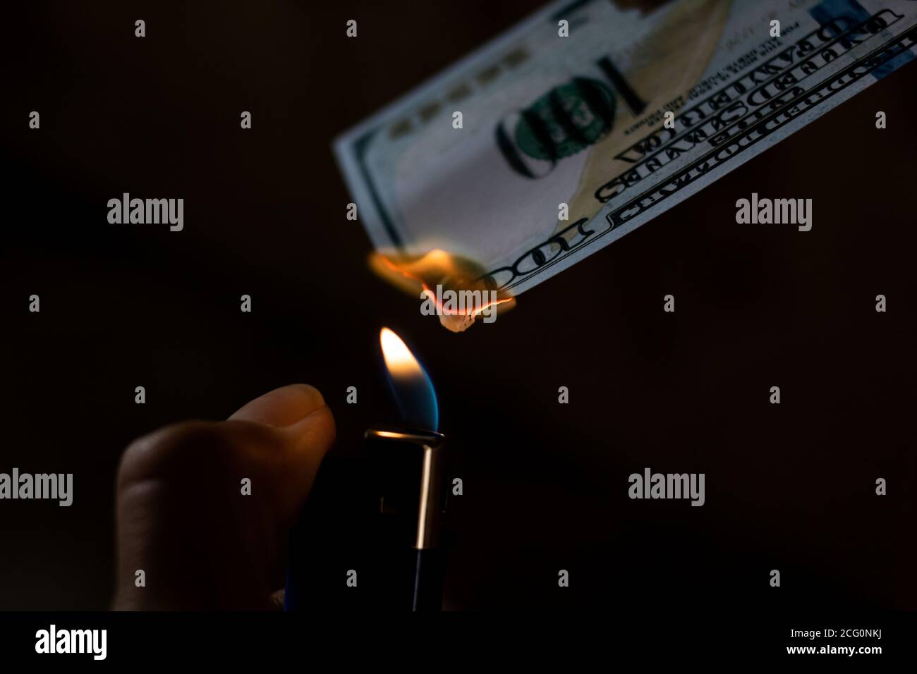 Burn money with lighter hi-res stock photography and images - Alamy