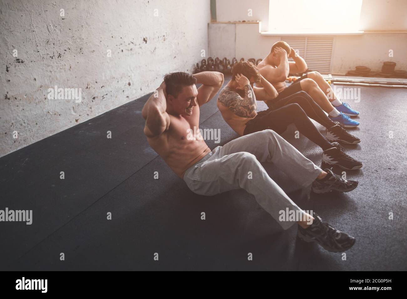 Teenage girl doing sit ups hi-res stock photography and images - Alamy