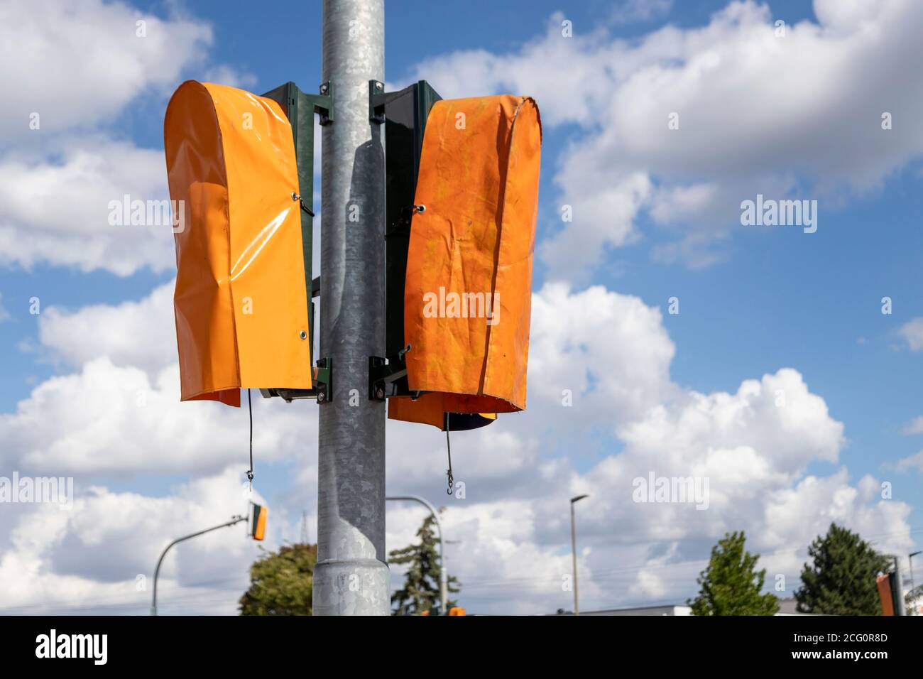 new traffic lights covered with orange plastic bags, outdoors Stock ...
